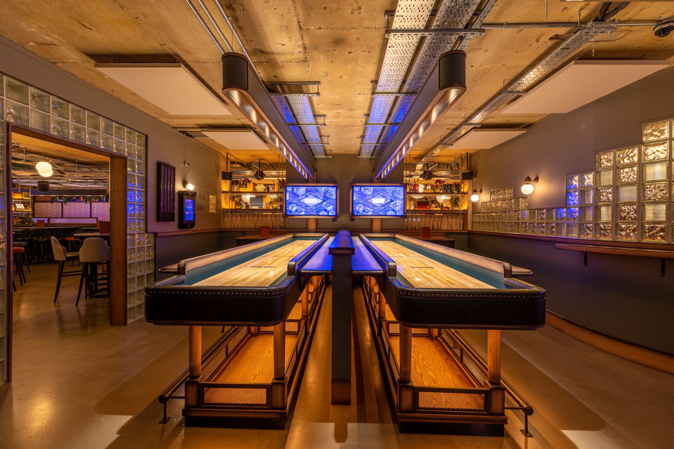 A new 'high-tech shuffleboard' bar is coming to Manchester this month